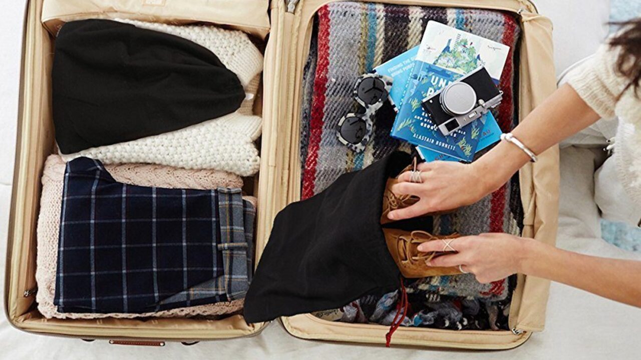 How To Pack Shoes In A Suitcase For Travel: Packing Hacks